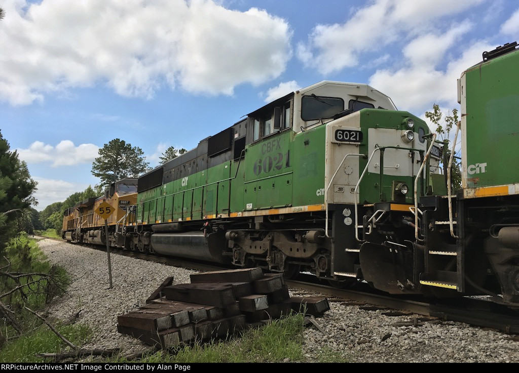 Ex-BN EMD SD60M 6021 runs third